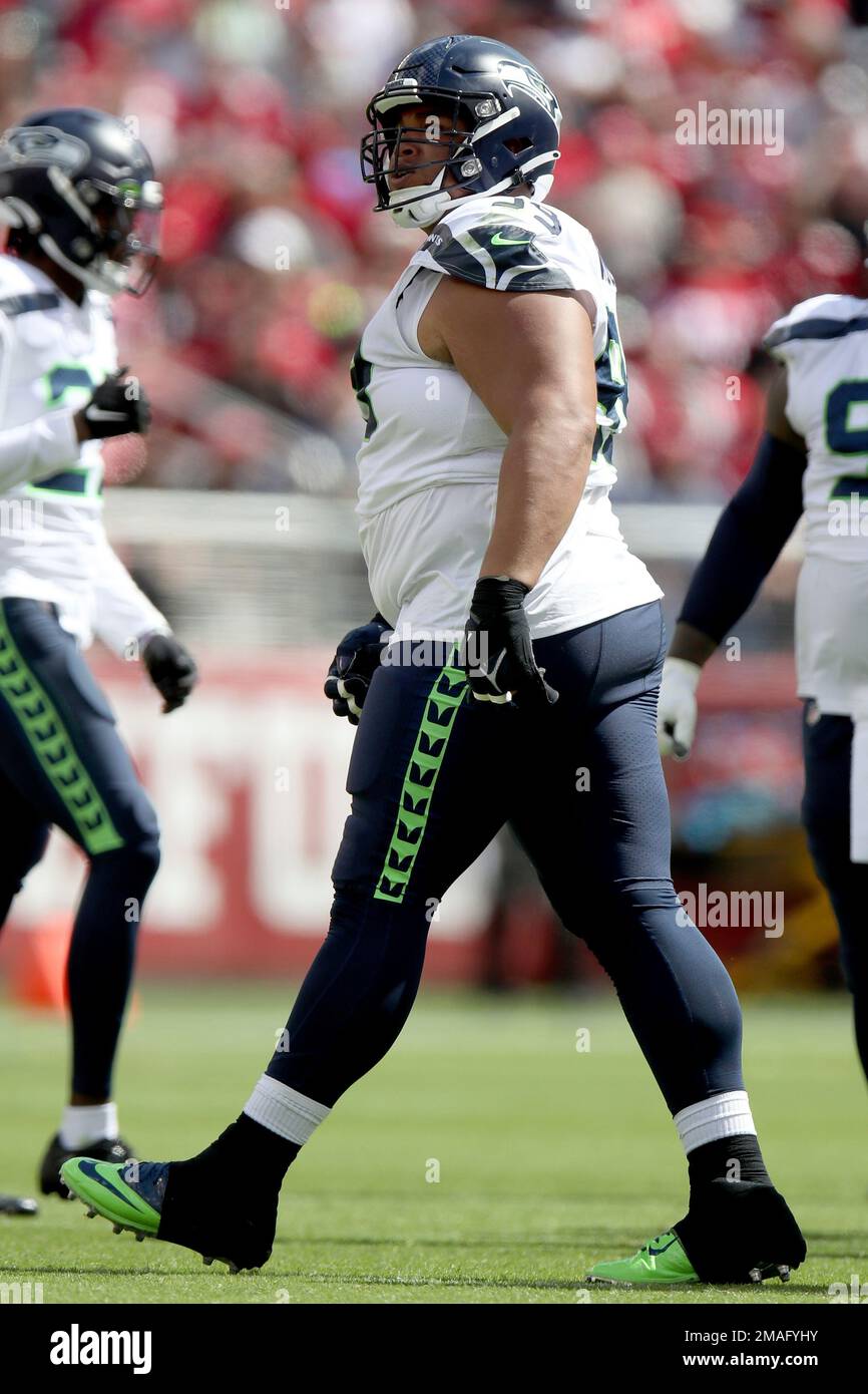 Seattle Seahawks defensive tackle Al Woods (99) reacts after a play ...