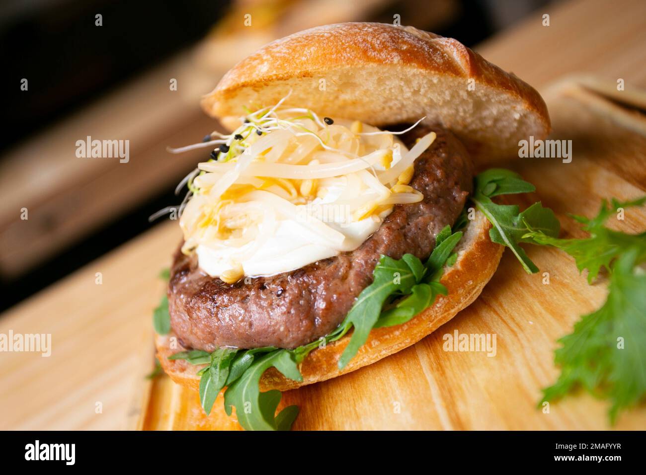 Authentic American burger with mayonnaise Stock Photo - Alamy