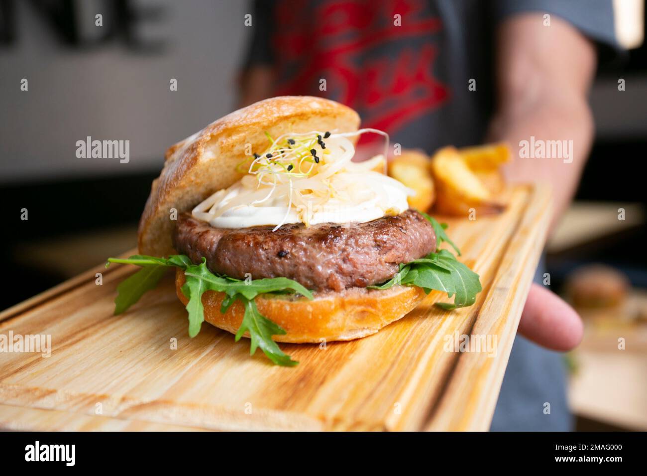 Authentic American burger with mayonnaise Stock Photo - Alamy