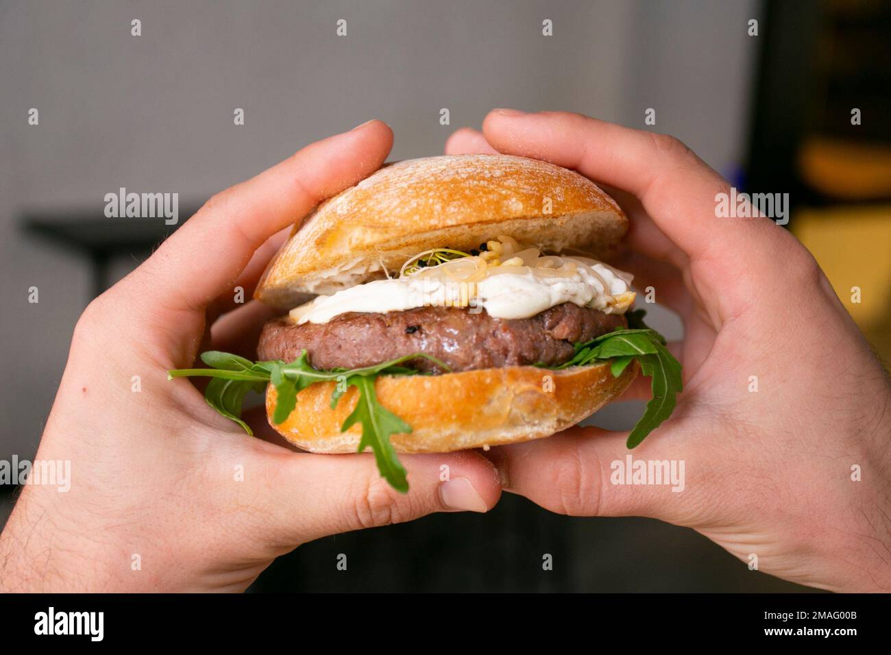 Authentic American burger with mayonnaise Stock Photo - Alamy