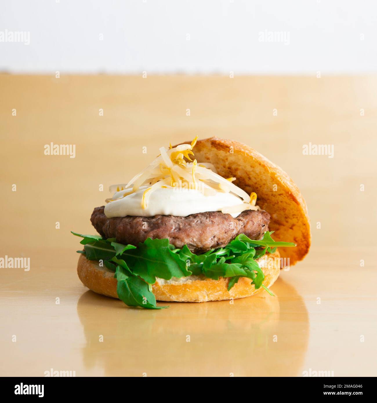 Authentic American burger with mayonnaise Stock Photo - Alamy