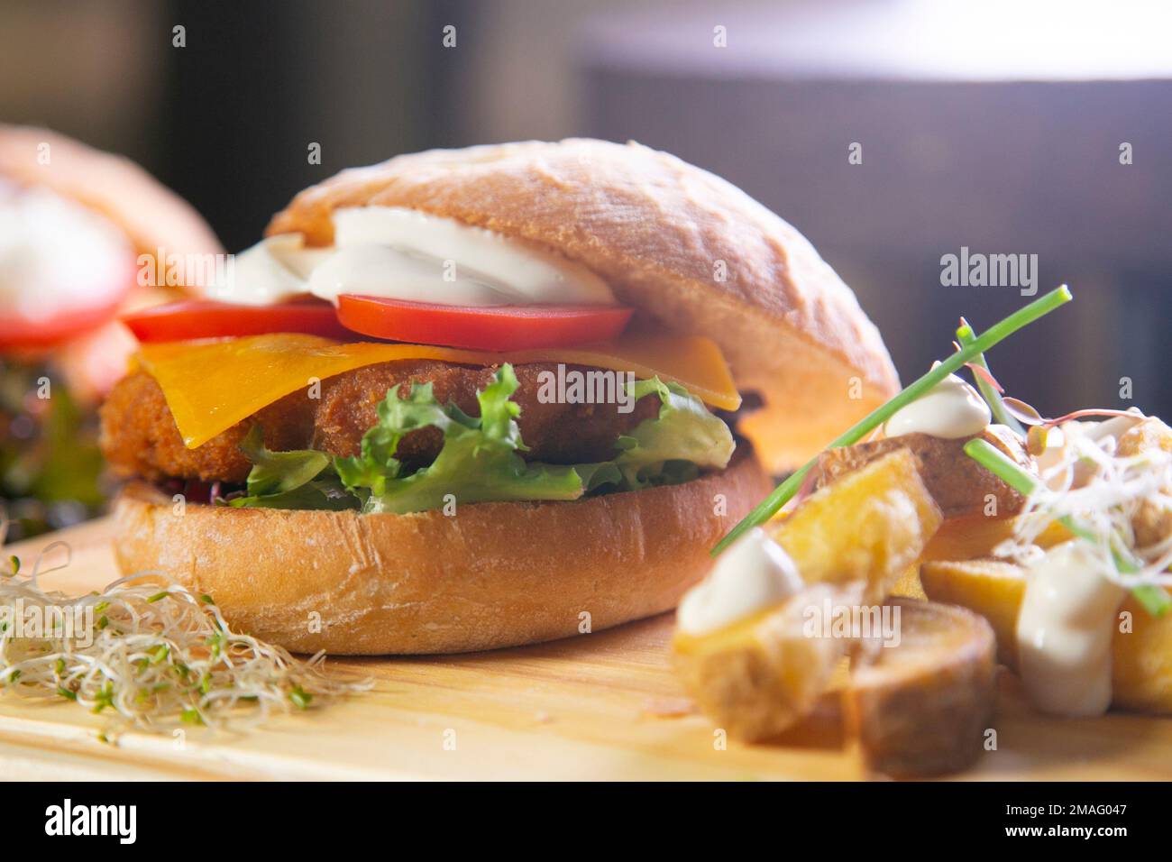Authentic American burger with mayonnaise Stock Photo - Alamy