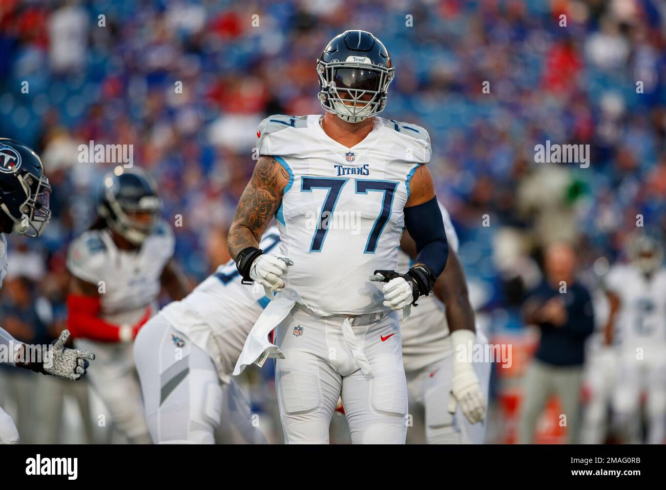 Tennessee Titans offensive tackle Taylor Lewan (77) warms up before an ...