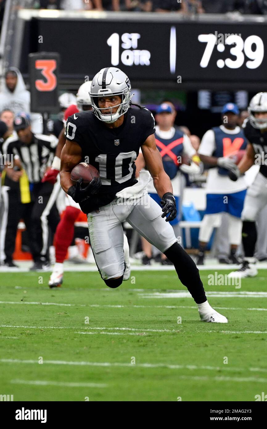 Las Vegas Raiders wide receiver Mack Hollins (10) runs with the ball ...