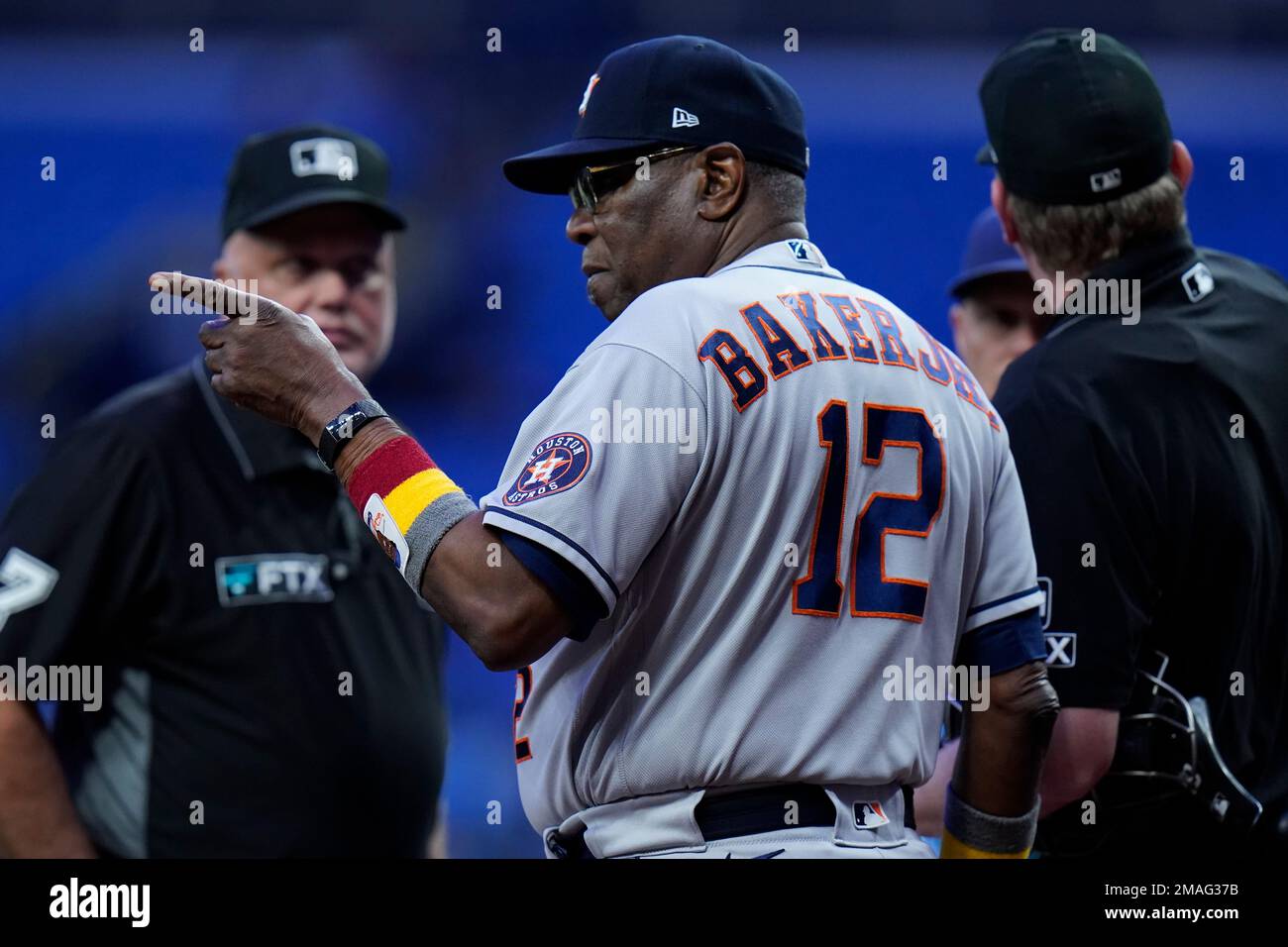 Houston Astros manager Dusty Baker Jr. gets instructions from the ...