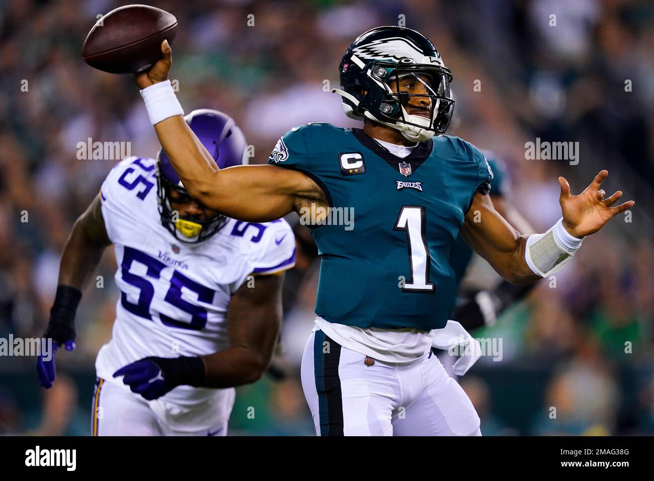 Philadelphia Eagles quarterback Jalen Hurts (1) throws a pass ahead of ...