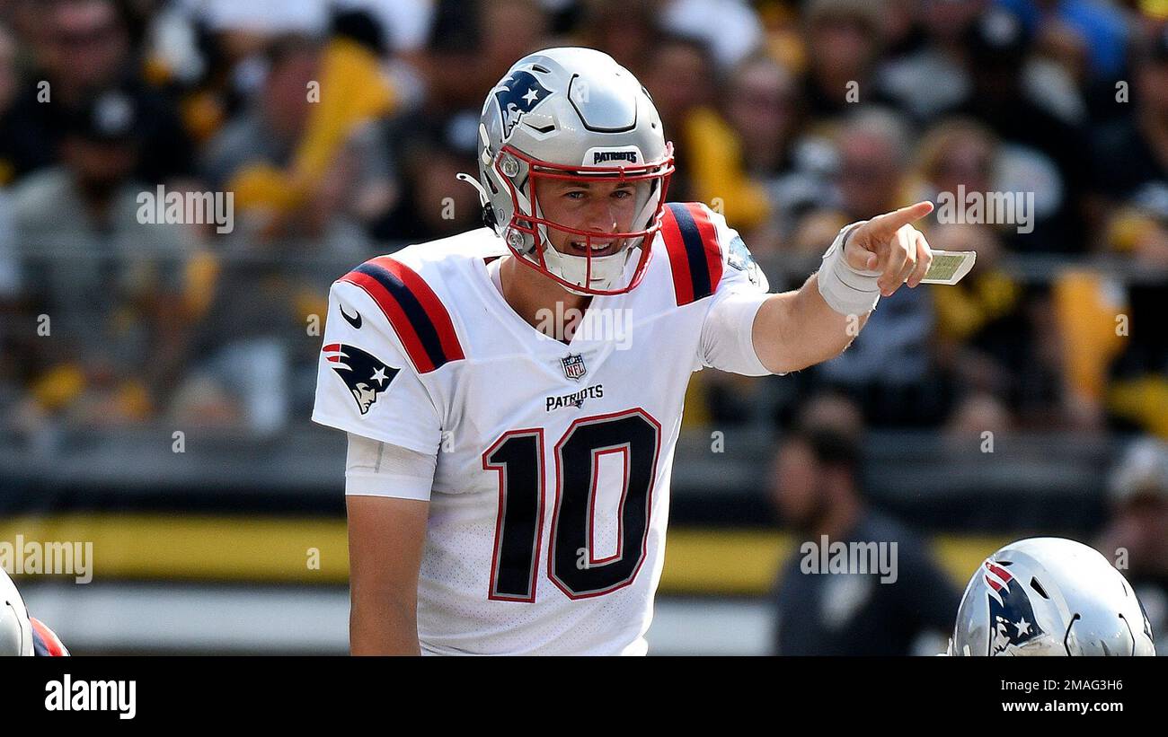 New England Patriots quarterback Mac Jones calls signals during the ...