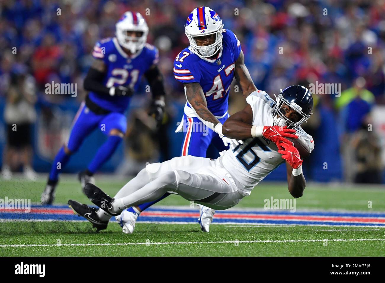 Tennessee Titans' Treylon Burks (16) catches a pass in front of Buffalo ...
