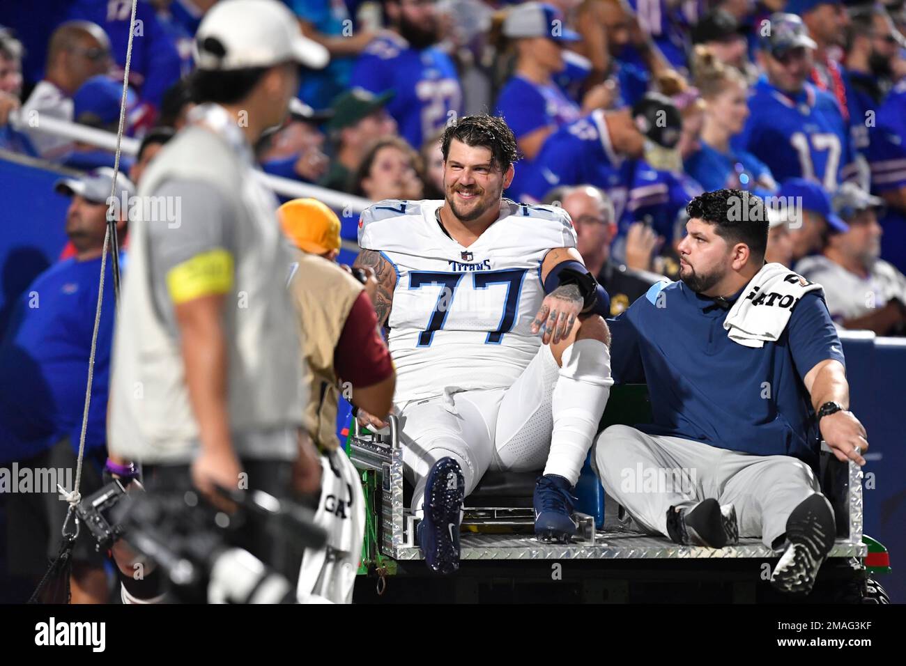 Tennessee Titans' Taylor Lewan (77) is carted off the field during the ...