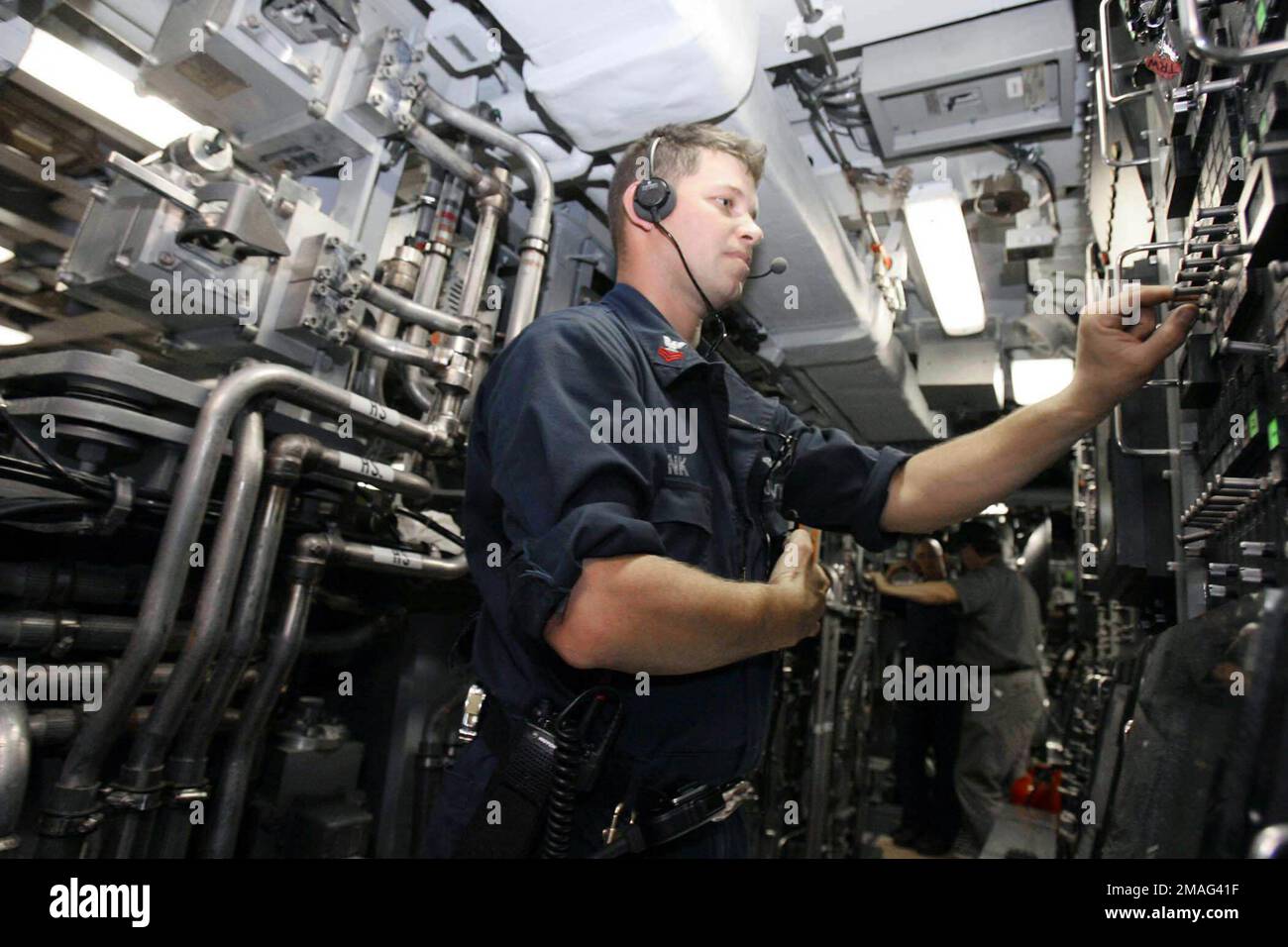 060825-N-7441H-011. [Complete] Scene Caption: U.S. Navy PETTY Officer ...