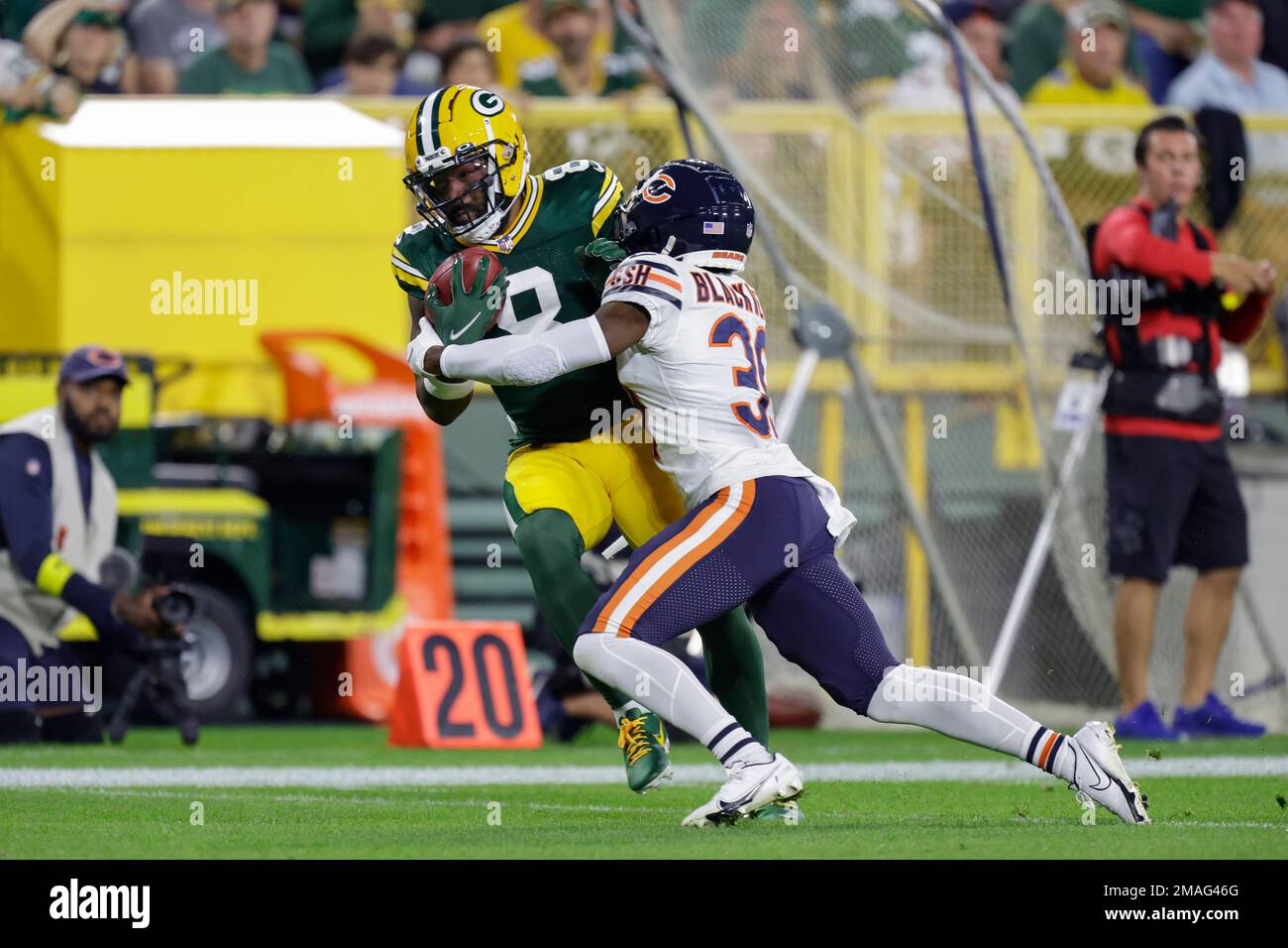 Green Bay Packers wide receiver Amari Rodgers is hit after making a ...