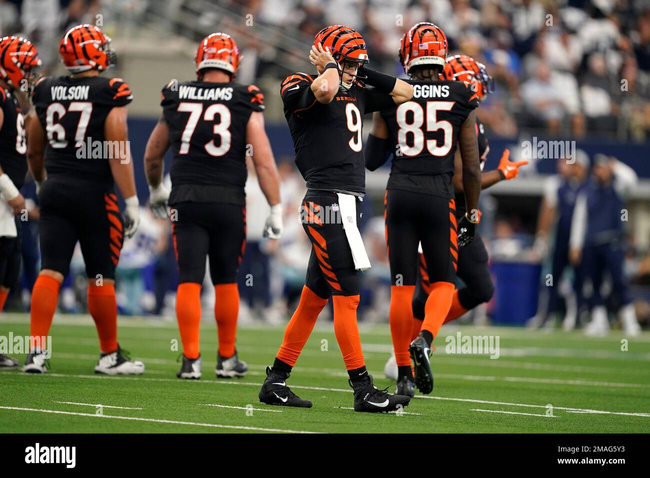 Cincinnati Bengals quarterback Joe Burrow (9) listens for the play call ...