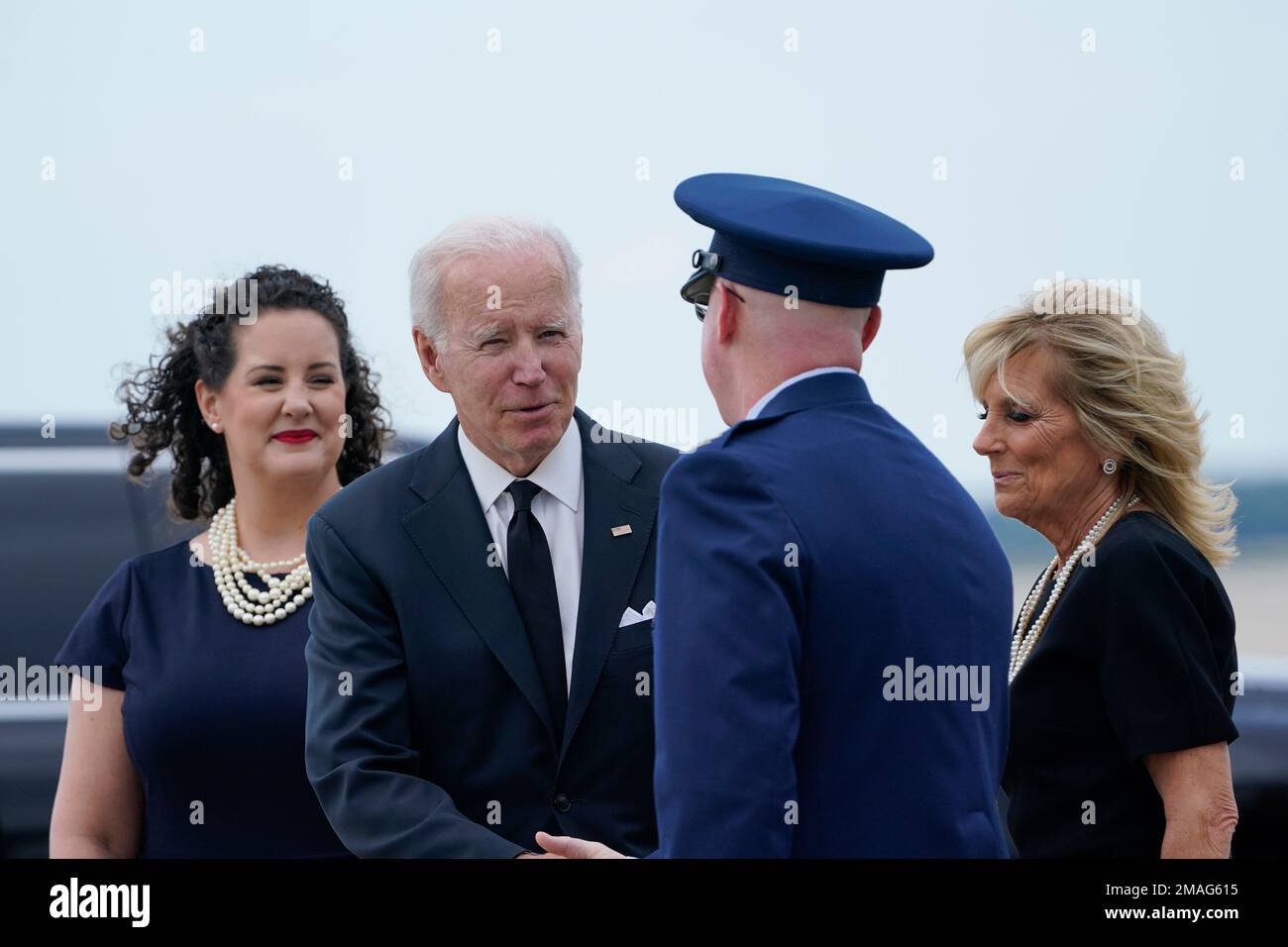 President Joe Biden and first lady Jill Biden are greeted by Col ...