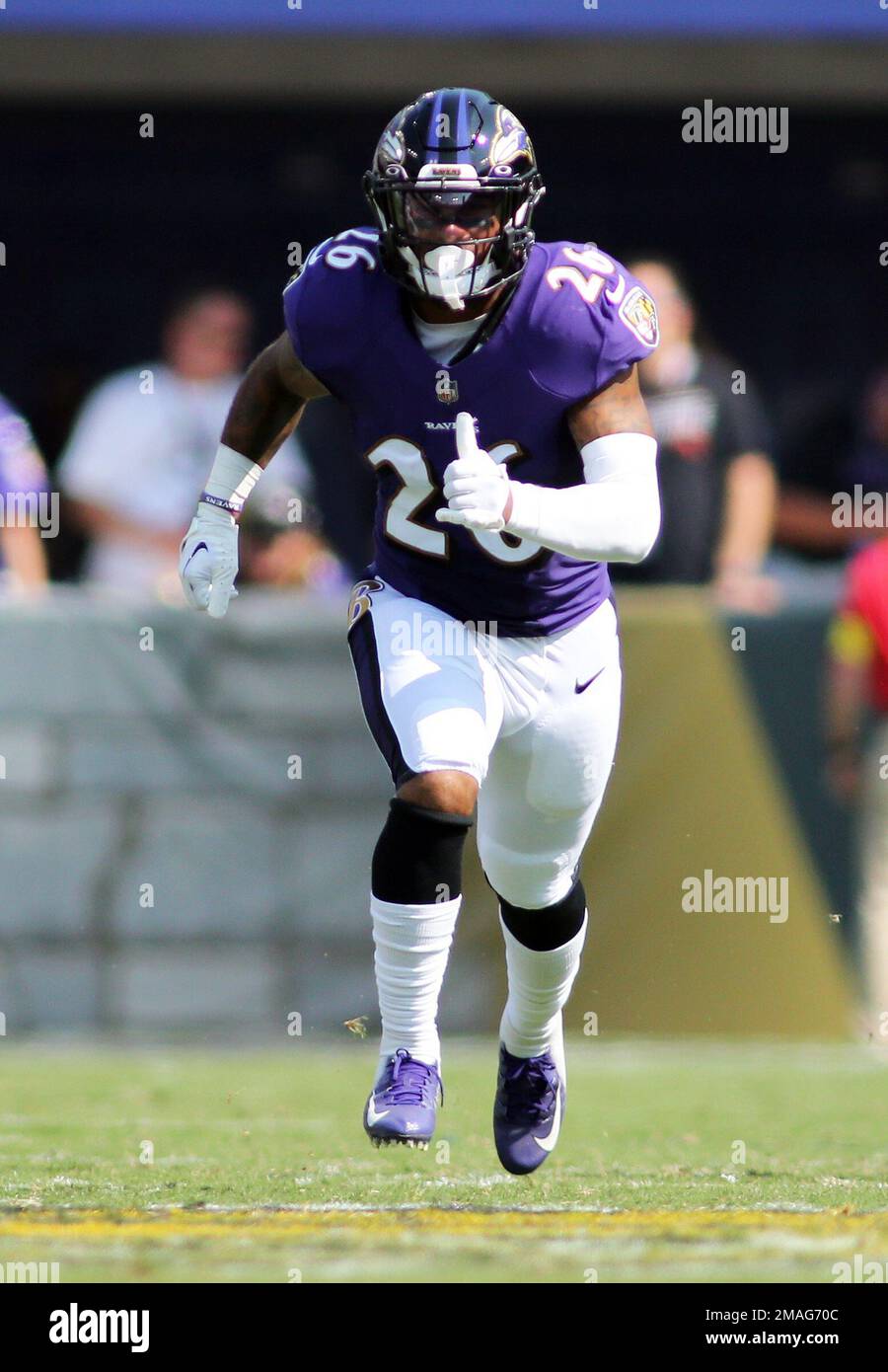 Baltimore Ravens safety Geno Stone (26) runs during an NFL football ...