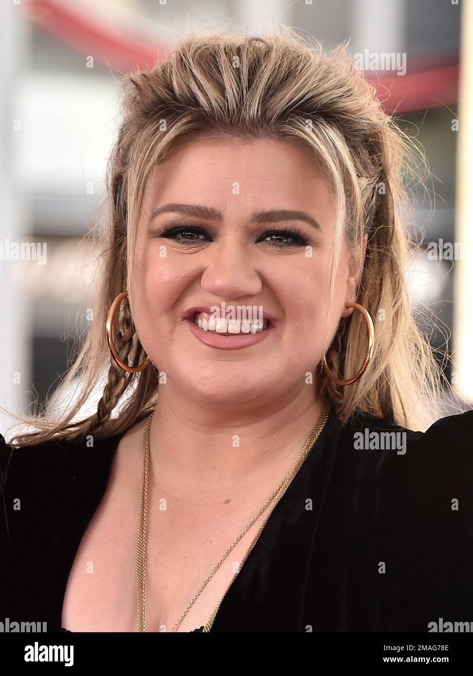 Singer and talk show host Kelly Clarkson attends a ceremony honoring ...