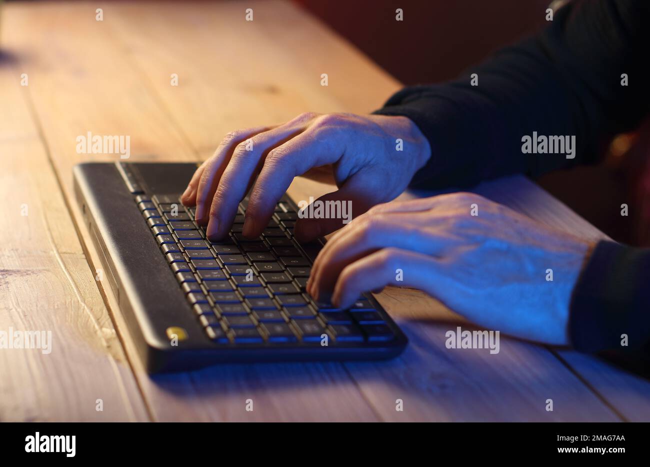 typing on the keyboard from the tv on the table of boards Stock Photo ...