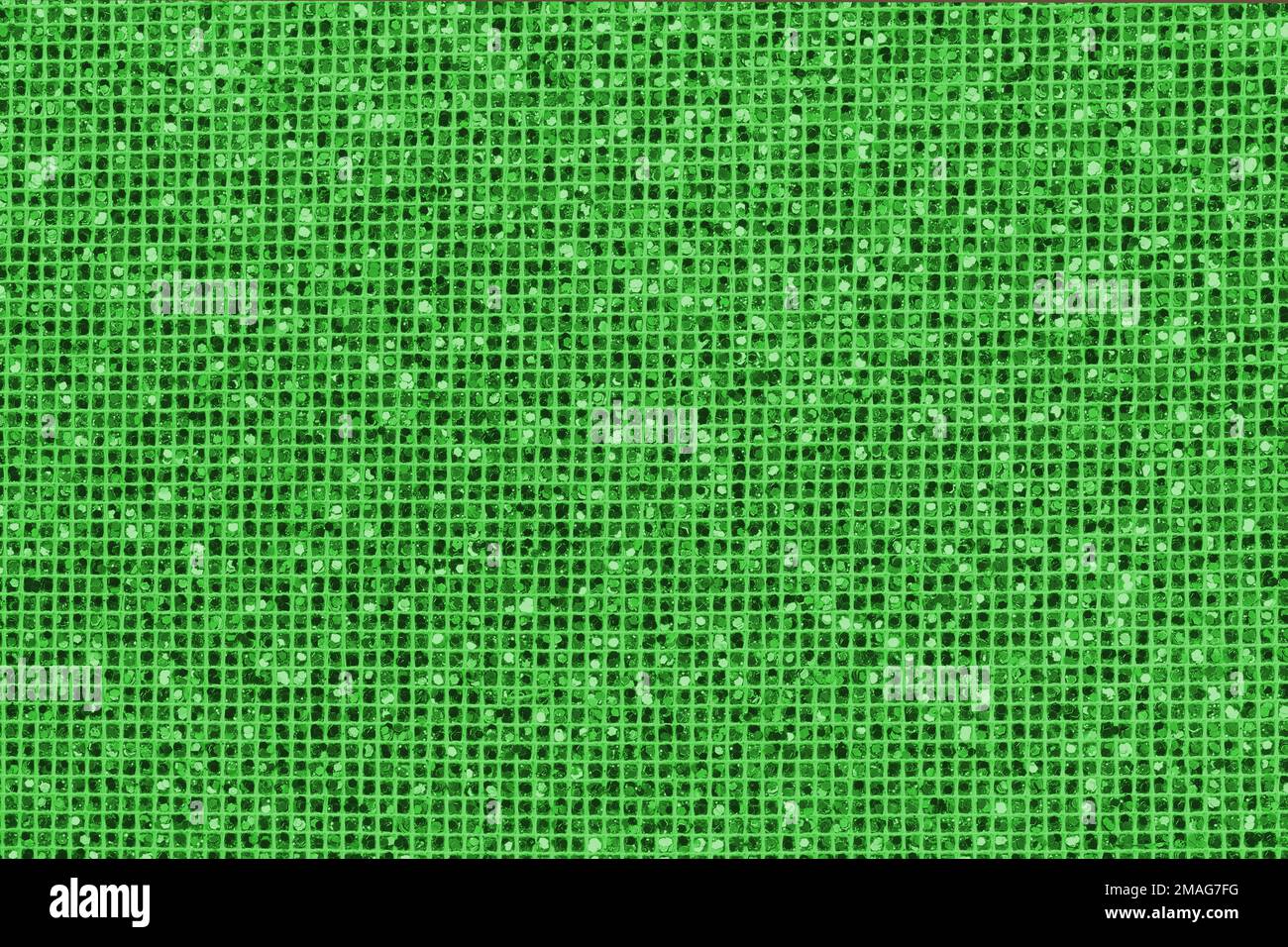 GREEN shimmering glitter material background with glowing effects and ...
