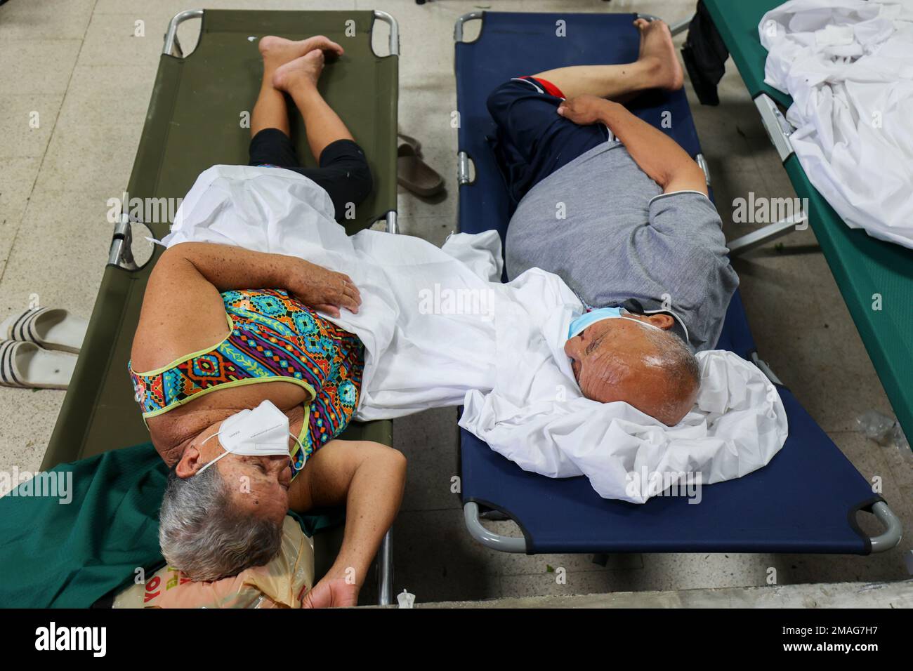 Residents affected by Hurricane Fiona rest at a storm shelter in ...