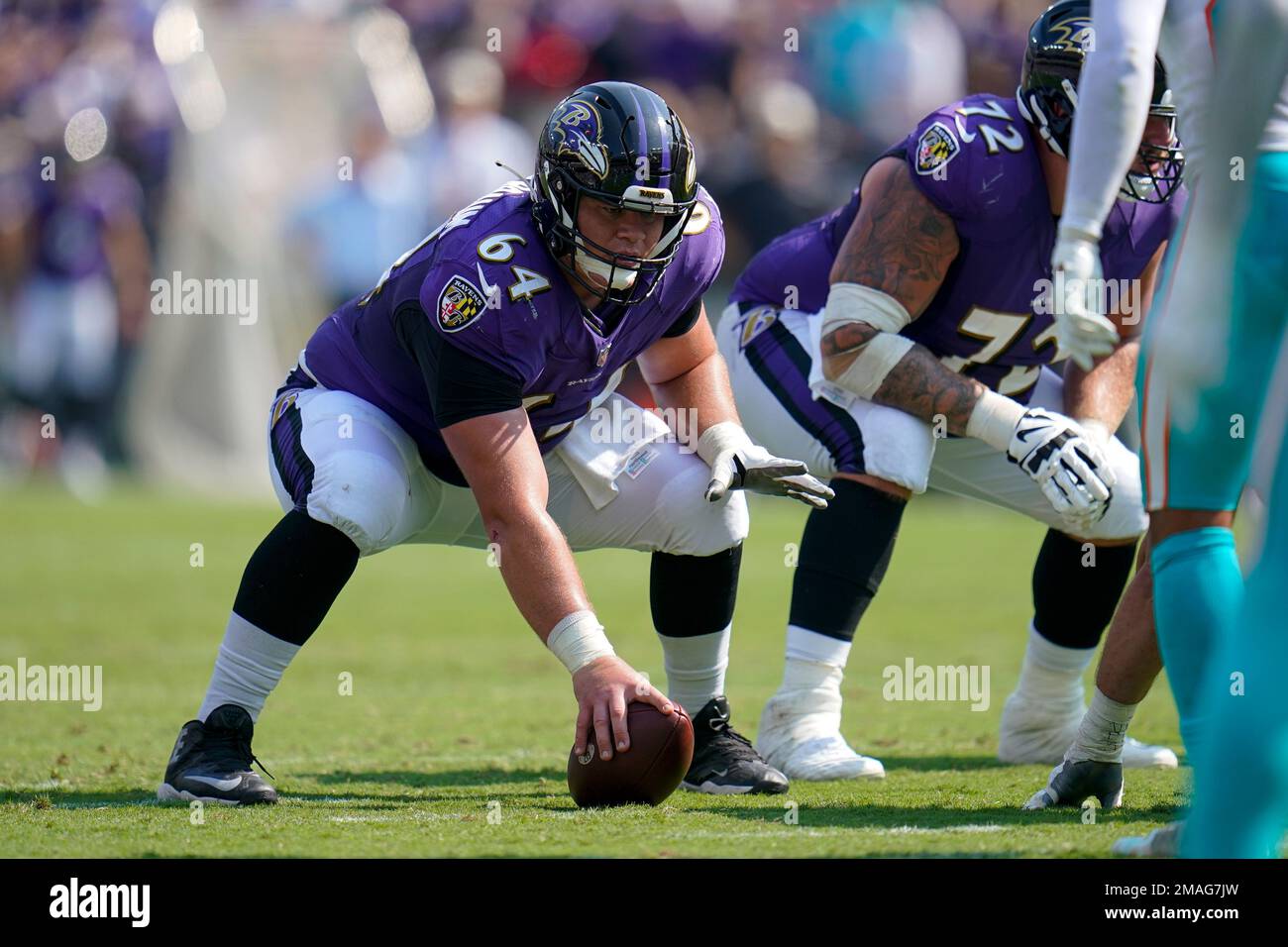 Baltimore Ravens center Tyler Linderbaum prepares for the snap against ...