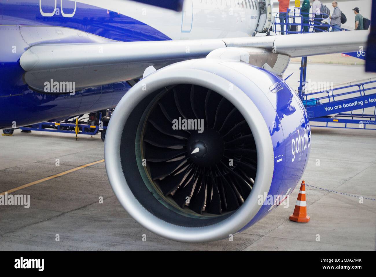 Indian aircraft landed in a busy airport terminal engine wings close ...