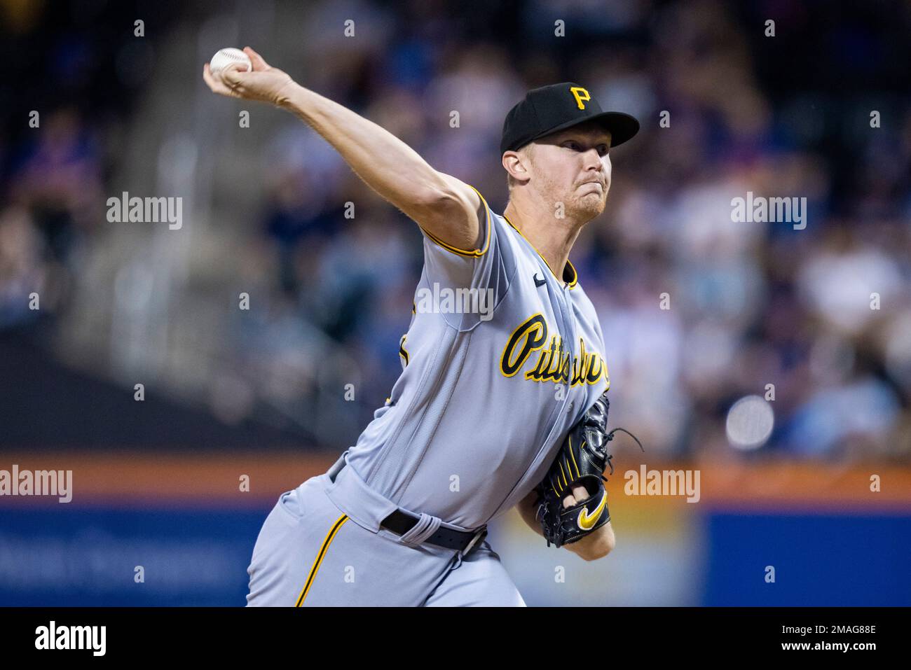 Pittsburgh Pirates starting pitcher Mitch Keller throws in the first ...