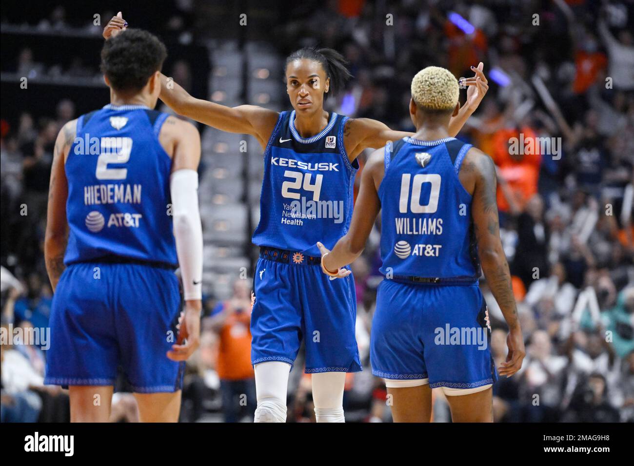 Connecticut Sun's DeWanna Bonner (24) rallies teammates Natisha ...