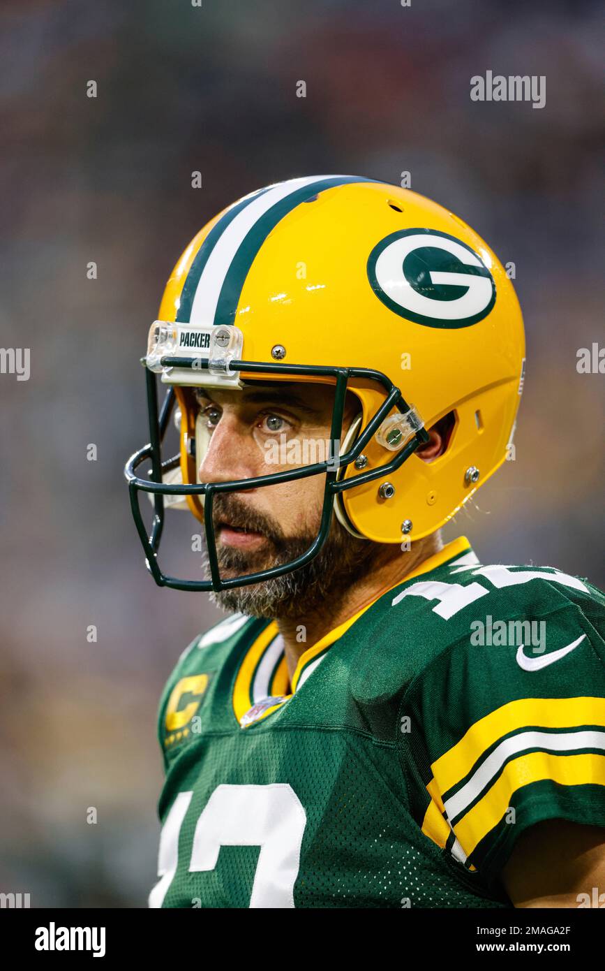Green Bay Packers quarterback Aaron Rodgers (12) warms up before their ...