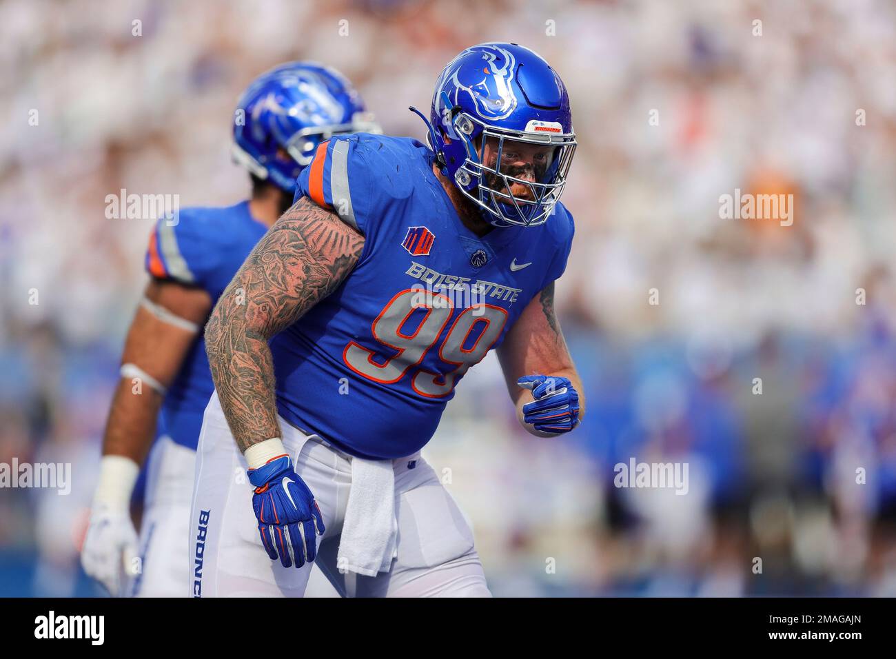 Boise State defensive tackle Scott Matlock (99) lines up against ...