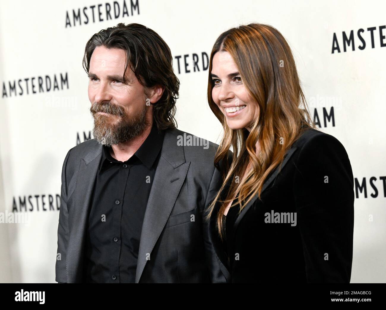 Christian Bale, left, and wife Sibi Blažić attend the world premiere of ...