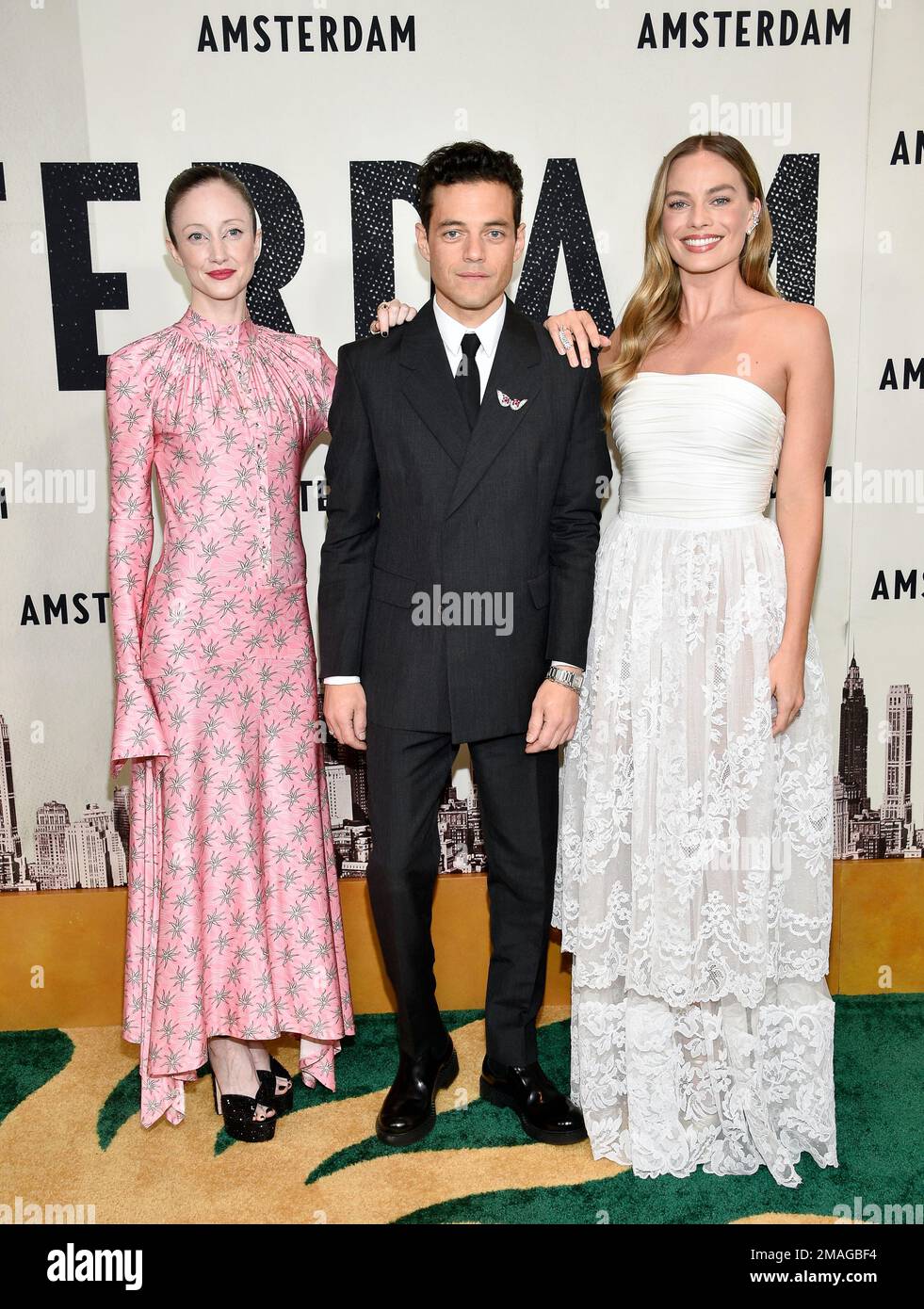 Andrea Riseborough, left, Rami Malek and Margot Robbie pose together at ...
