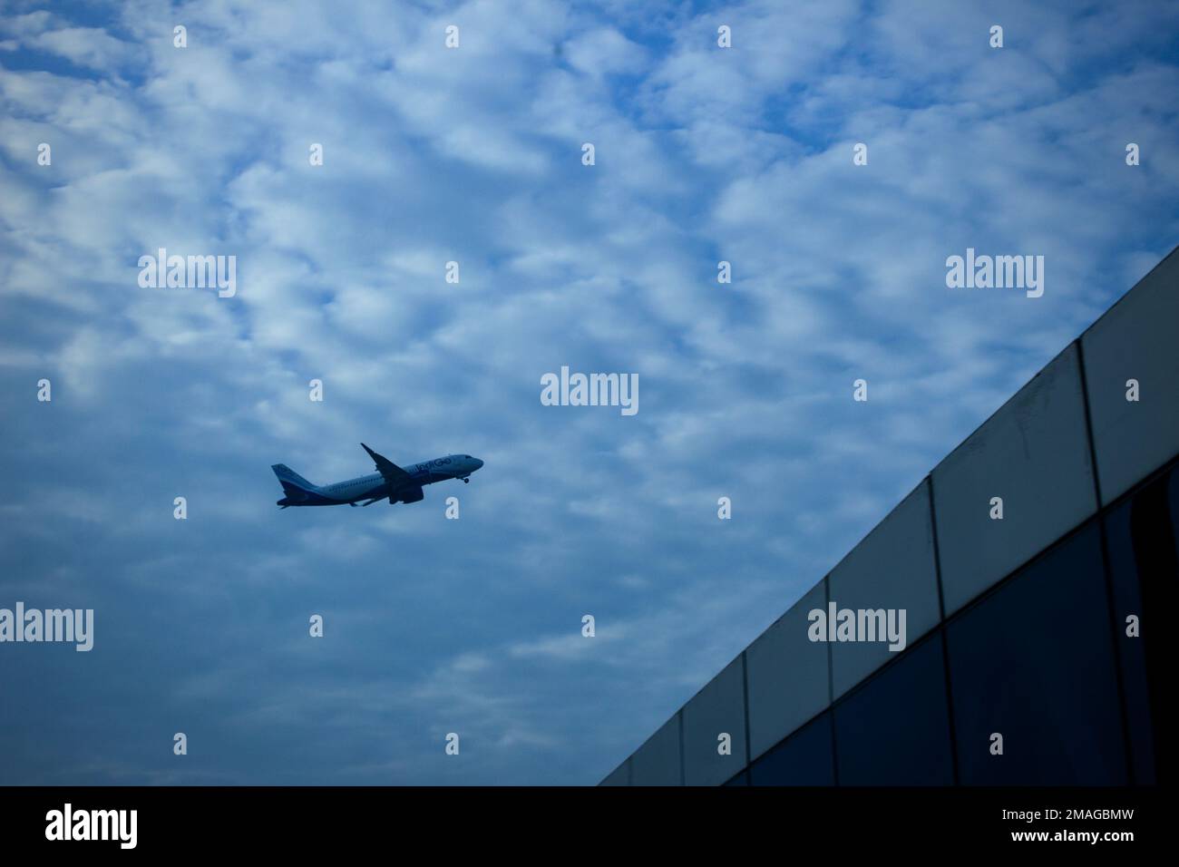 Indian aircraft landed in a busy airport terminal engine wings close ...