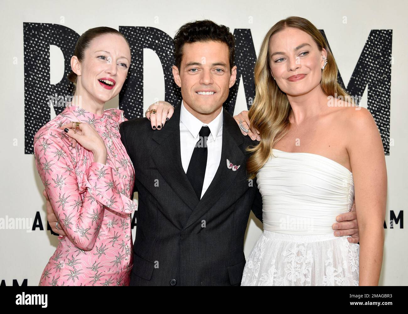 Andrea Riseborough, left, Rami Malek and Margot Robbie pose together at ...