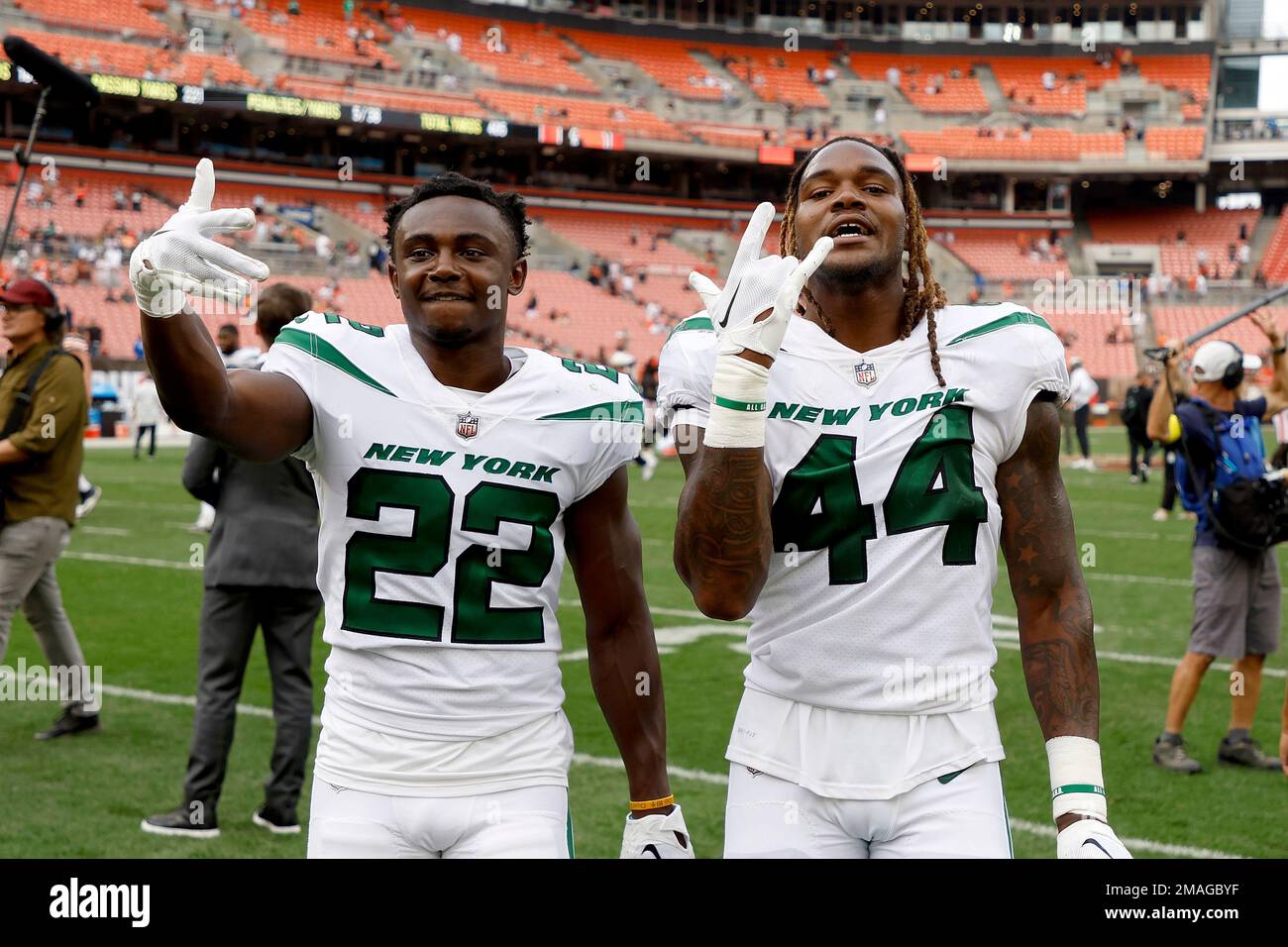 New York Jets safety Tony Adams (22) and linebacker Jamien Sherwood (44 ...