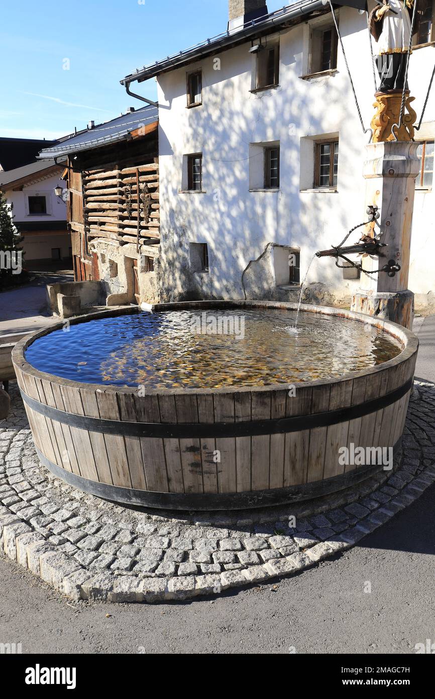 a wooden well with an old water pump Stock Photo - Alamy