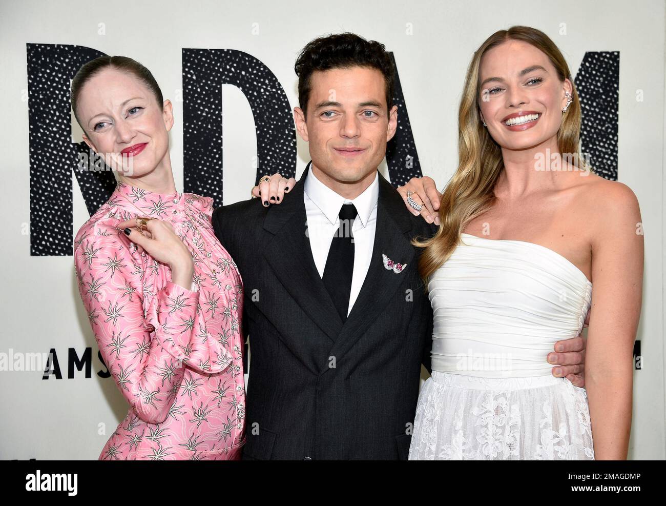Andrea Riseborough, left, Rami Malek and Margot Robbie pose together at ...