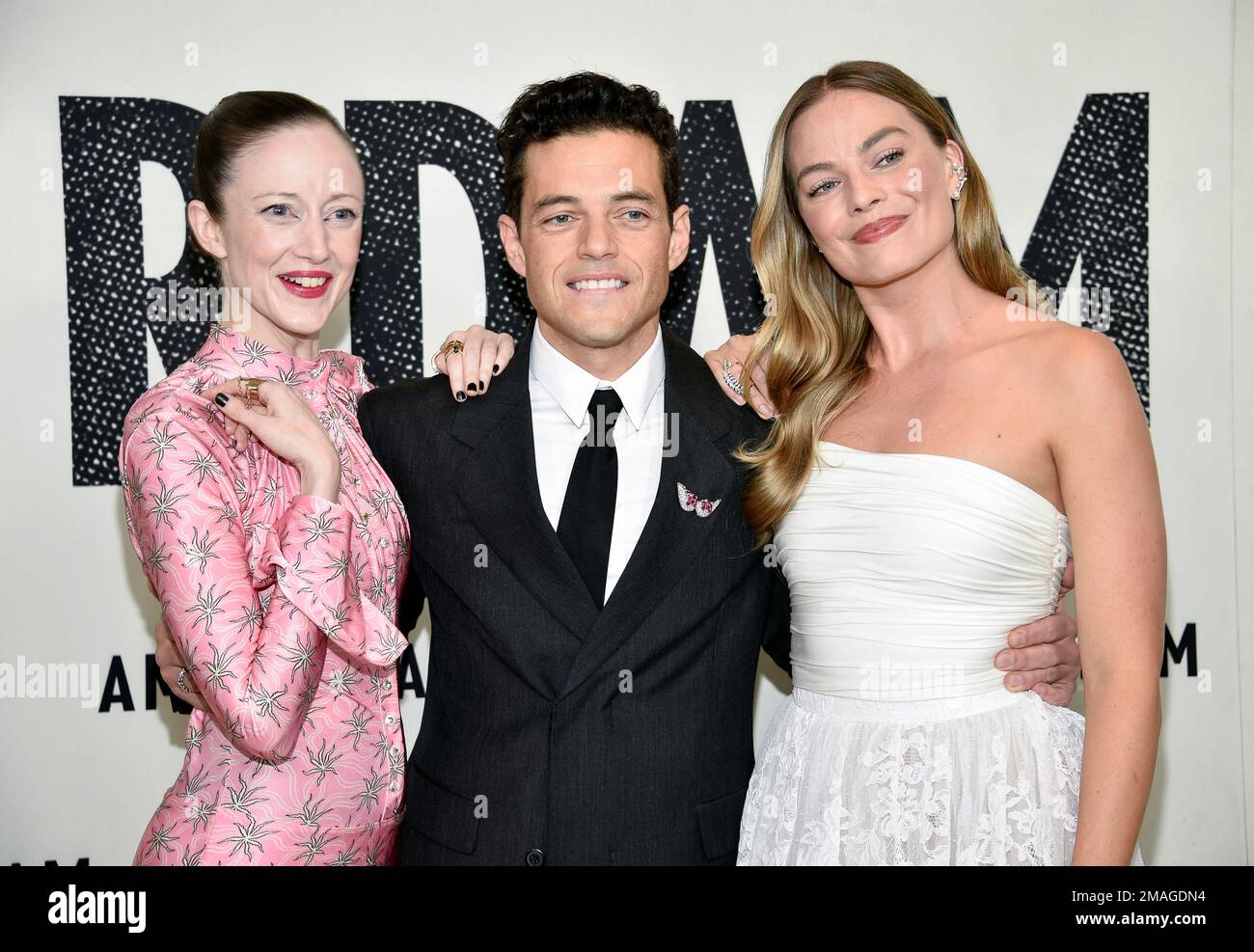 Andrea Riseborough, left, Rami Malek and Margot Robbie pose together at ...