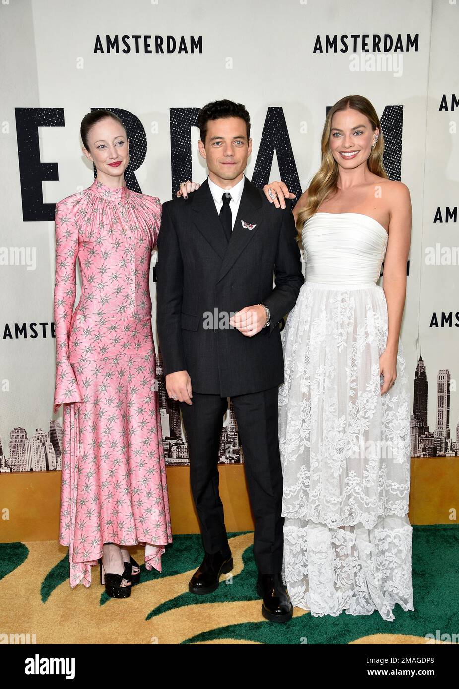 Andrea Riseborough, left, Rami Malek and Margot Robbie pose together at ...