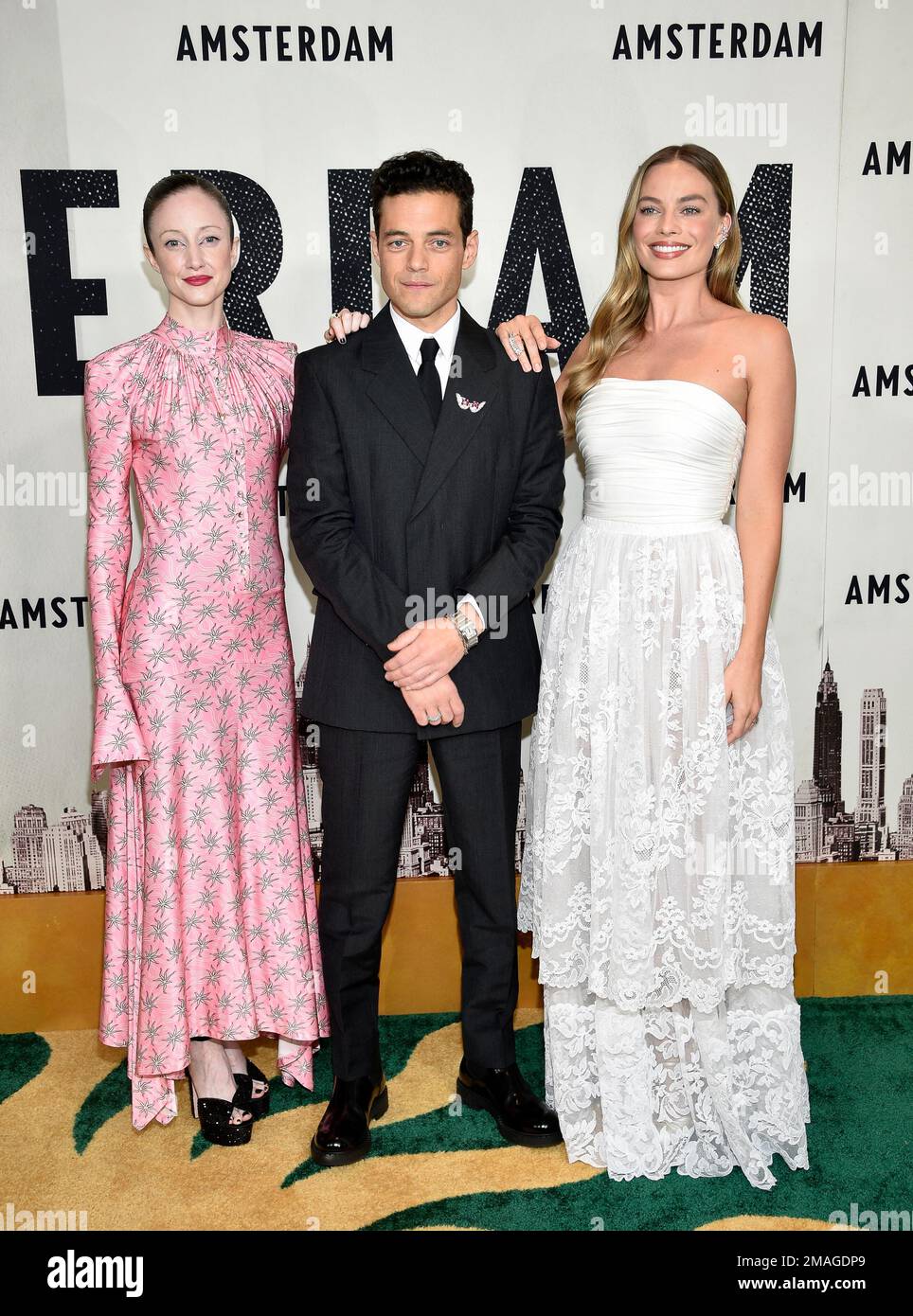 Andrea Riseborough, left, Rami Malek and Margot Robbie pose together at ...