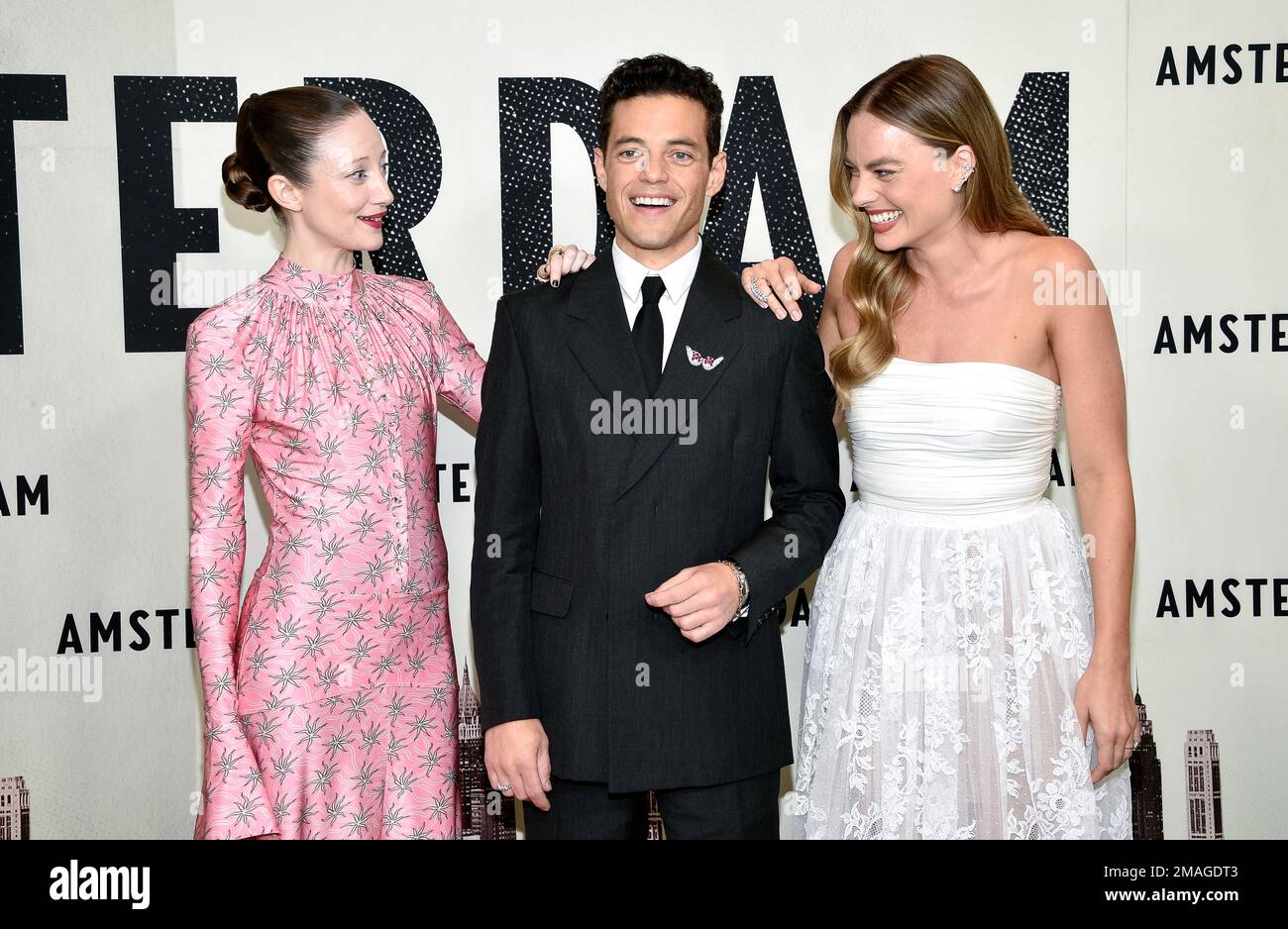 Andrea Riseborough, left, Rami Malek and Margot Robbie pose together at ...