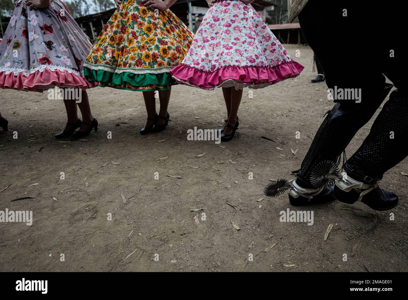 Dancers perform a traditional dance known as a “Cueca” at the country´s ...