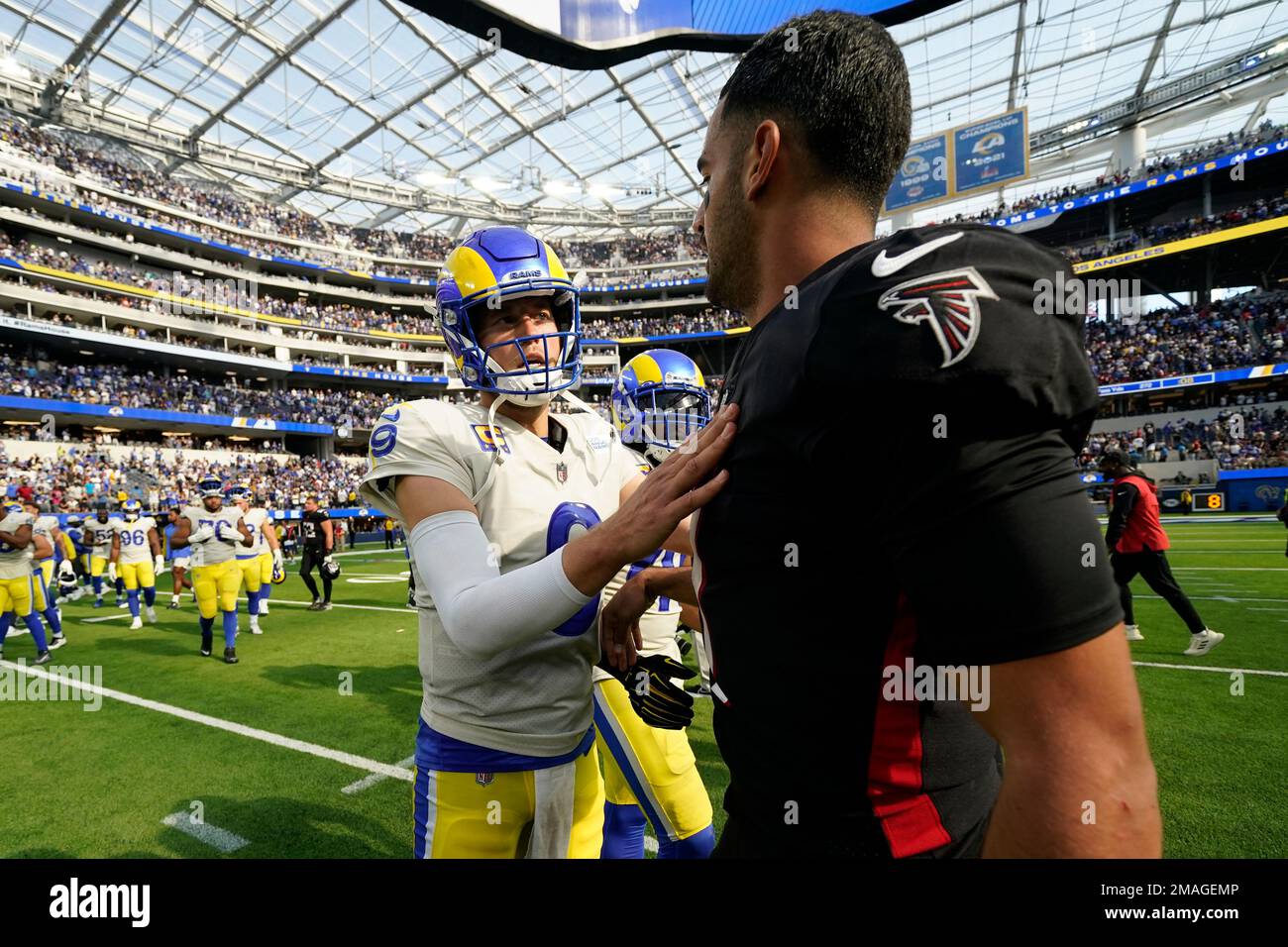 Atlanta Falcons quarterback Marcus Mariota, right, greets Los Angeles ...