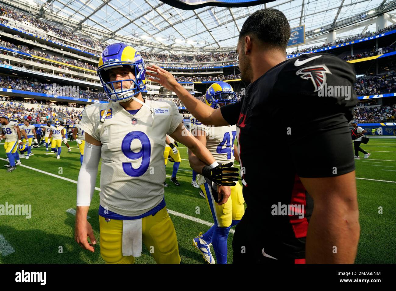 Atlanta Falcons quarterback Marcus Mariota, right, greets Los Angeles ...