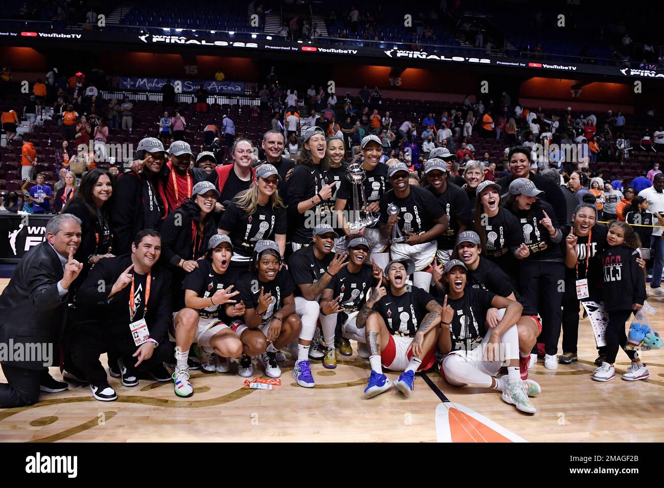 The Las Vegas Aces Pose For A Photo With The Championship Trophy After