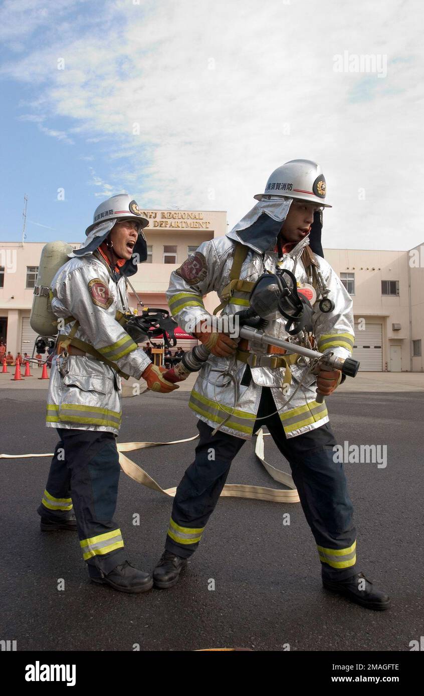 Red rooster firefighting competition hi-res stock photography and ...
