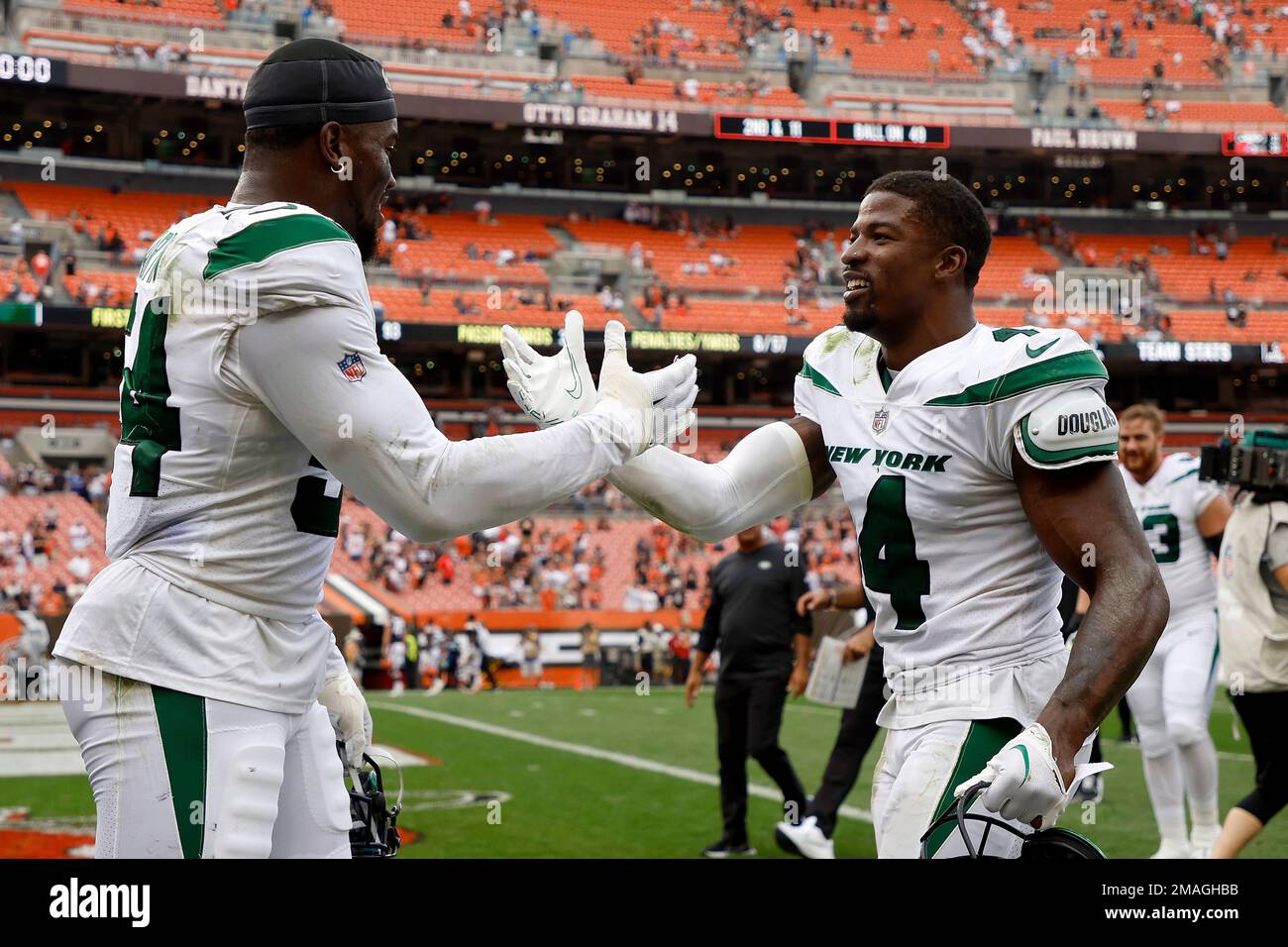 New York Jets defensive end Jacob Martin (54) and cornerback D.J. Reed ...