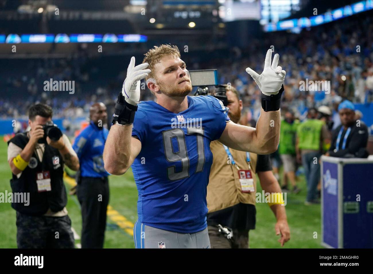 Detroit Lions defensive end Aidan Hutchinson (97) celebrates after an ...