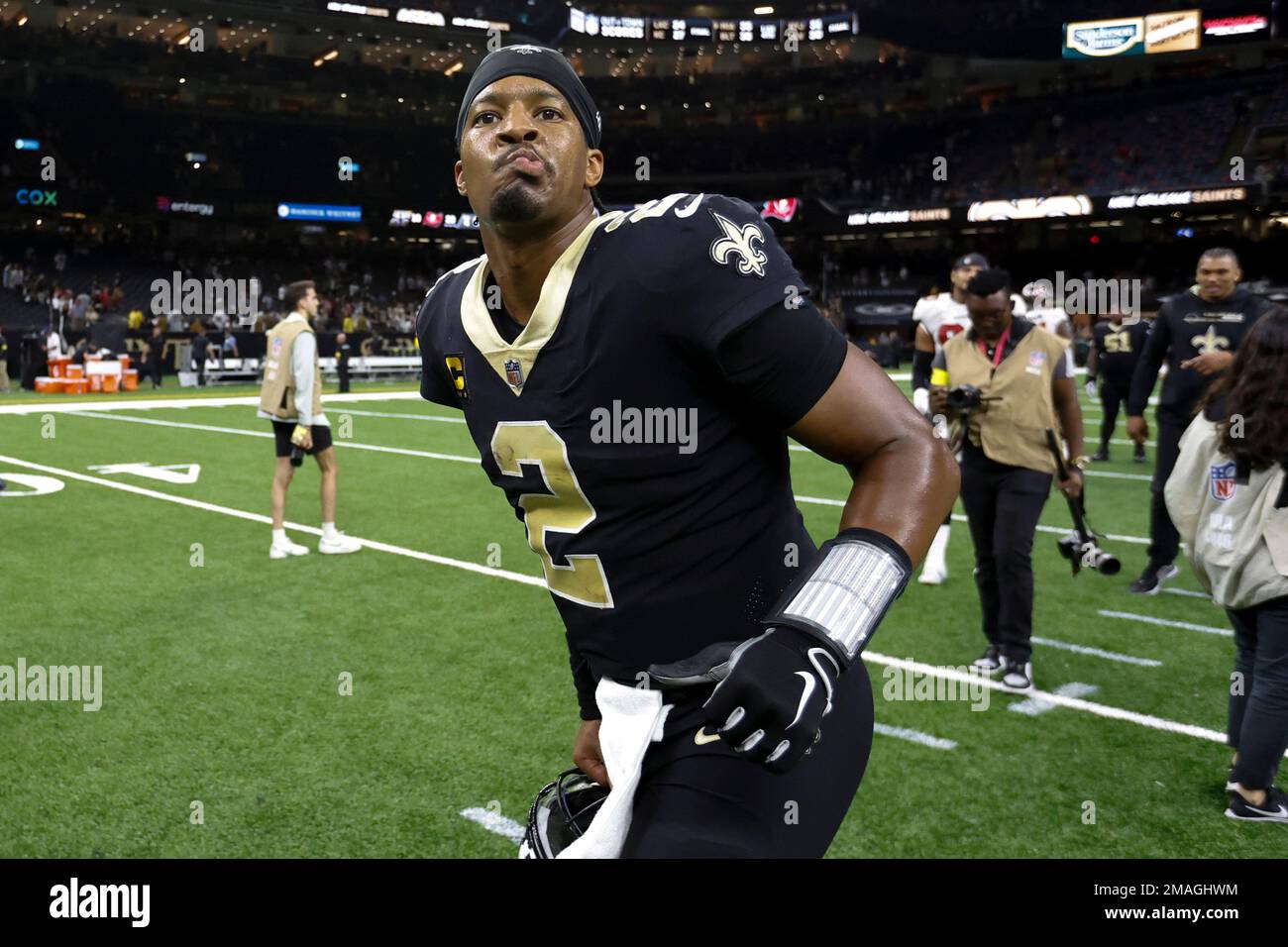 New Orleans Saints quarterback Jameis Winston leaves the field after ...
