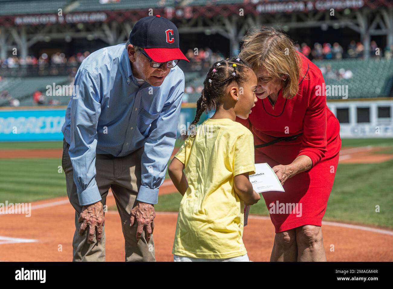 Ohio Gov. Mike DeWine, left, and his wife Fran, right, give Isobel ...