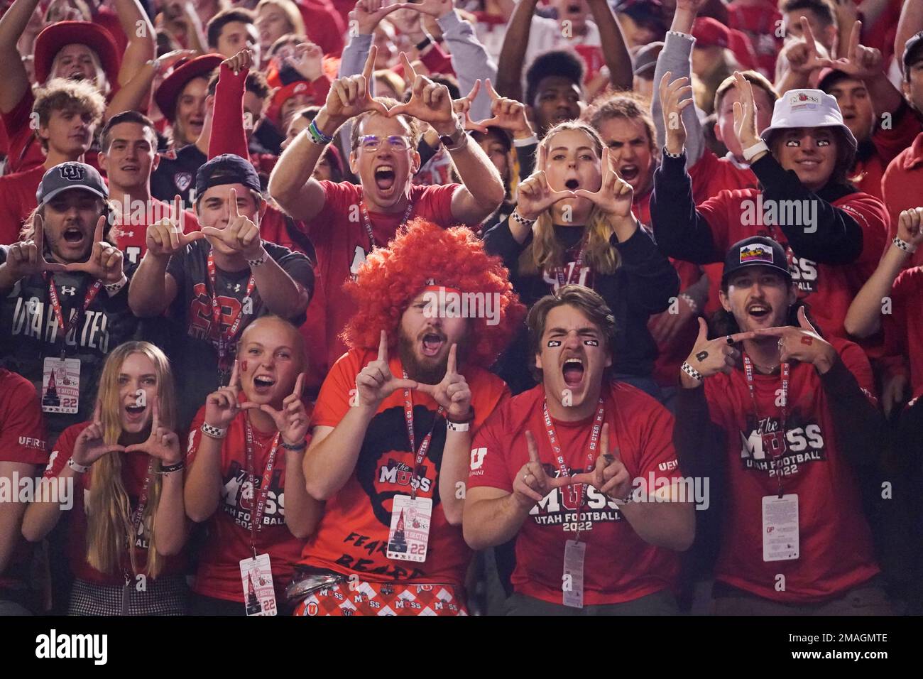 Utah fans show their support during the first half of an NCAA college ...