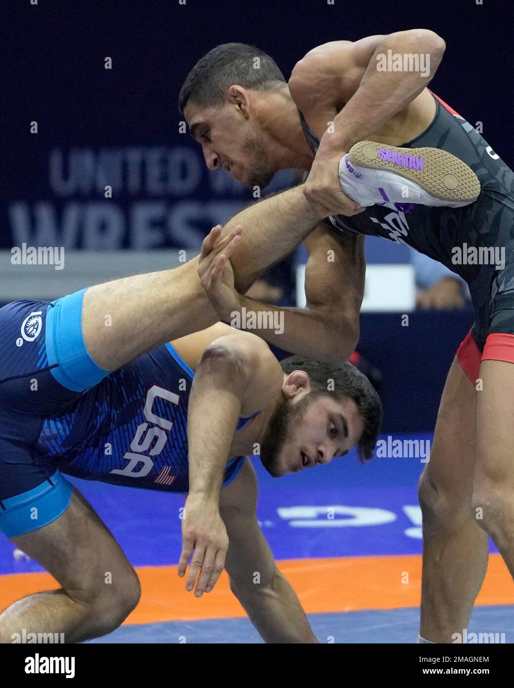 Iran's Rahman Mousa Amouzadkhalili, right, and John Michael ...